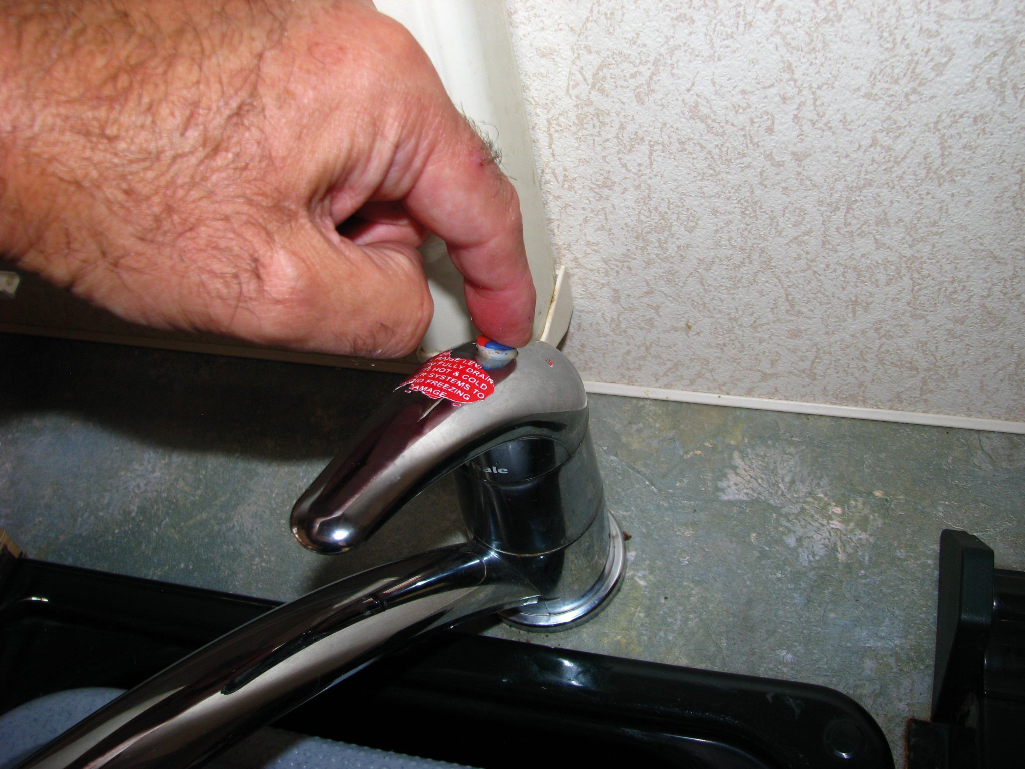 How to replace a tap micoswitch in your caravan - Practical Caravan