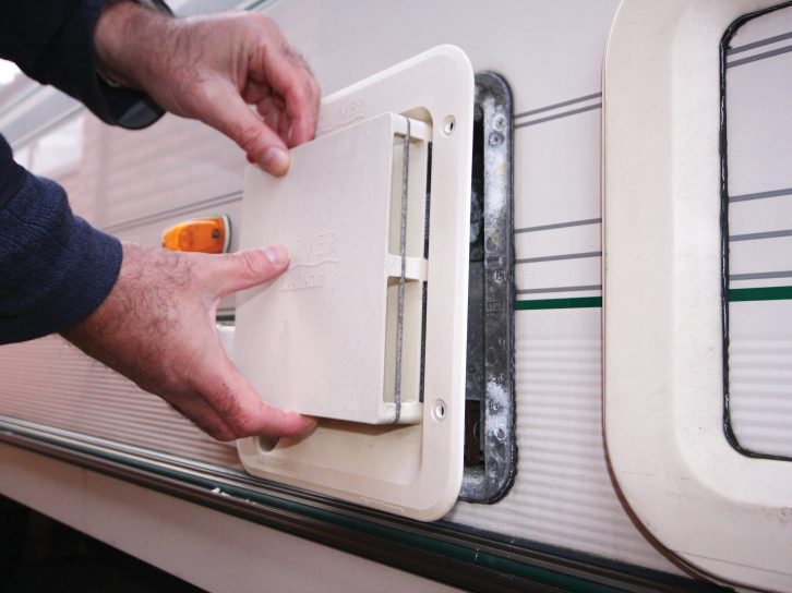 How to clean a Carver Cascade GE water heater's burner - Practical Caravan